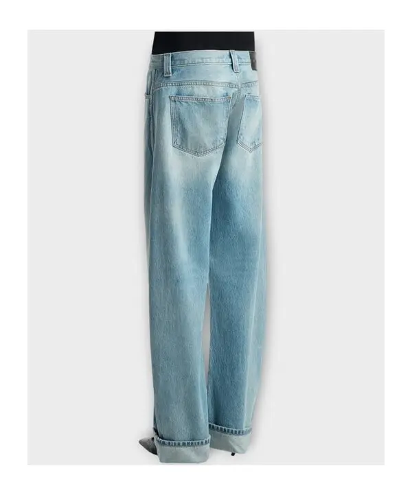 Khaite Karo Low-rise Curved Leg Jeans