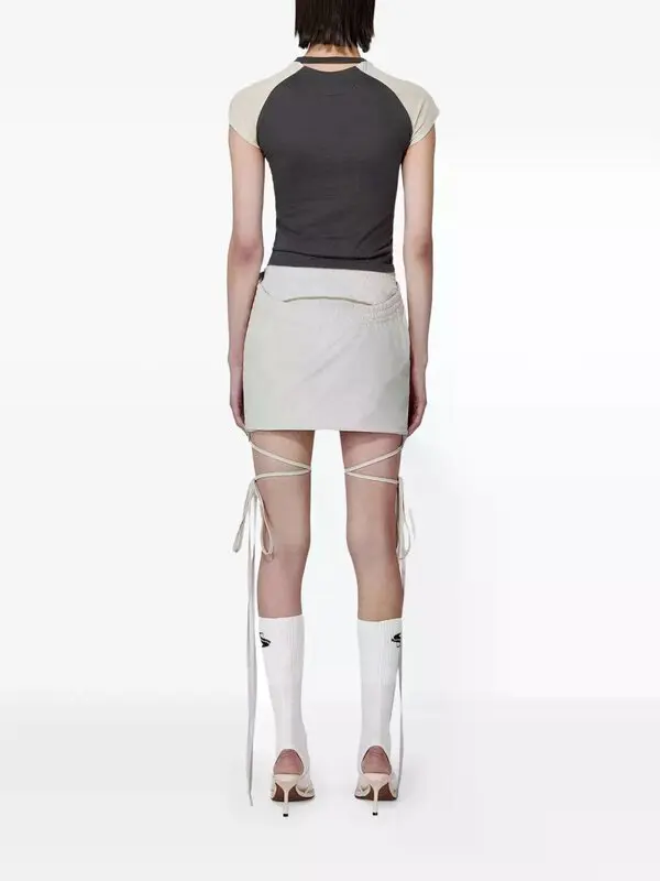 SRVC STUDIO Slash Mini Track Skirt