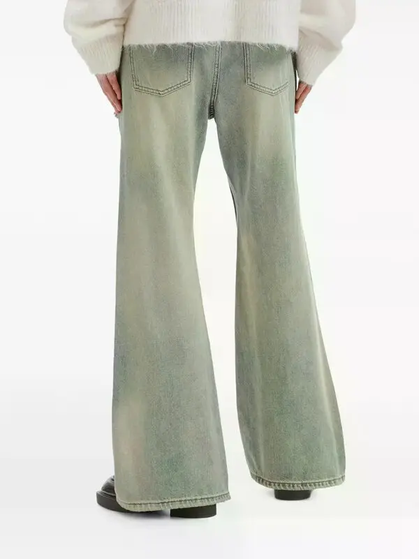 TOUT A COUP Distressed Flared Jeans