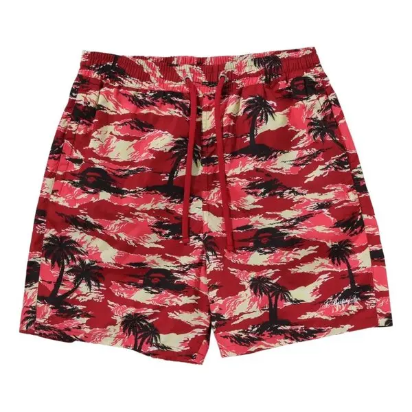 A BATHING APE Palm Tree Camo Relaxed Fit Beach Shorts - Red