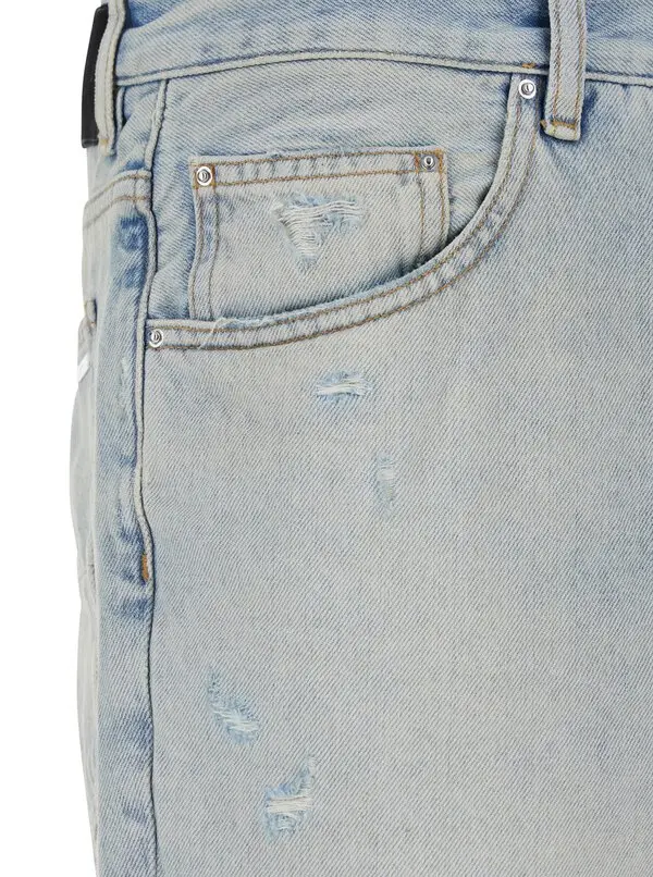 Amiri Light Blue Denim Jeans With Ripped Details And Logo Patch On The Back - Multicolor