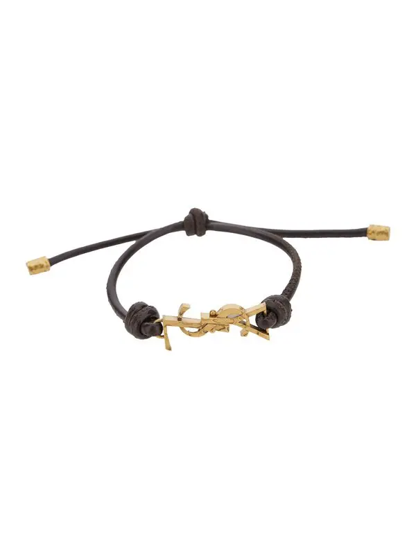 Saint Laurent Bracelet With Gold Cassandre Logo Plate And Adjustable Closure In Leather For