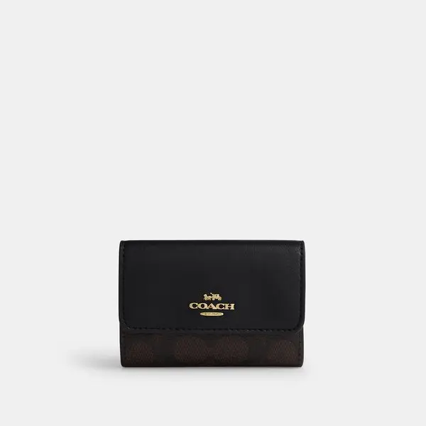 COACH OUTLET Flap Card Case In Signature Canvas - Gold/walnut/black