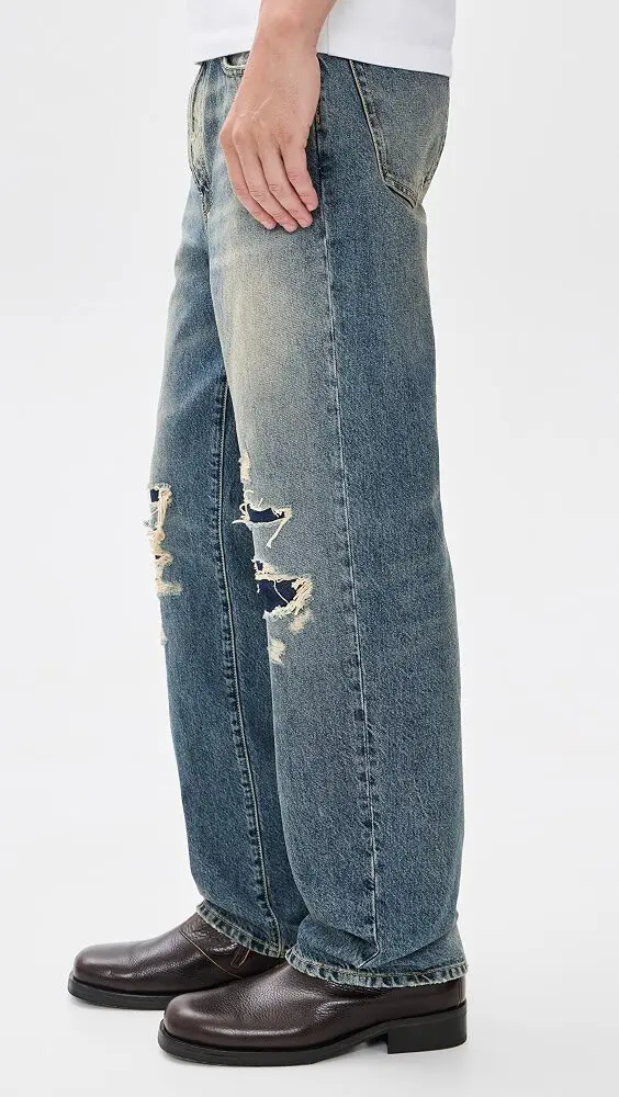 MAISON MARGIELA Distressed Denim Trousers