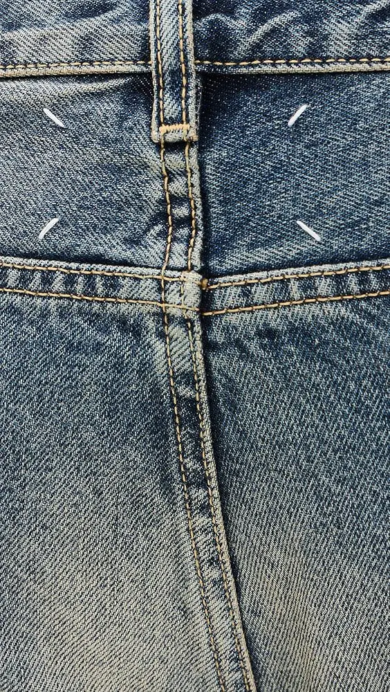 MAISON MARGIELA Distressed Denim Trousers