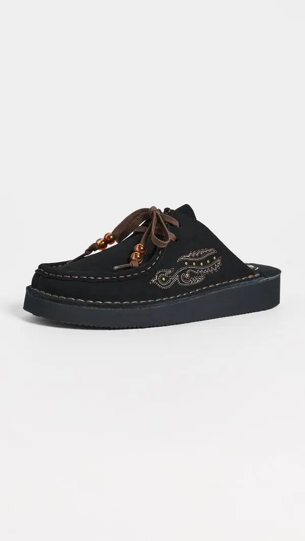 Clarks Nomad Mules