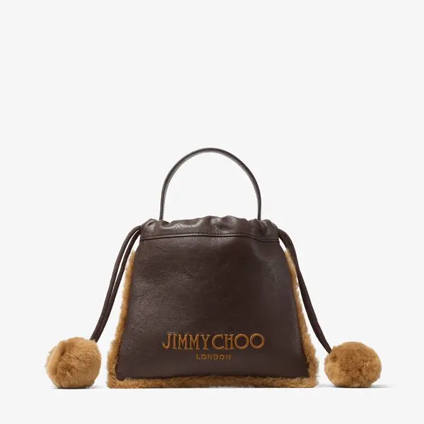 JIMMY CHOO Drawstring Pouch Top Handle Chocolate And Toffee Biker Leather And Shearling Drawstring Pouch With Pom-poms - Chocolate/toffee/ecru