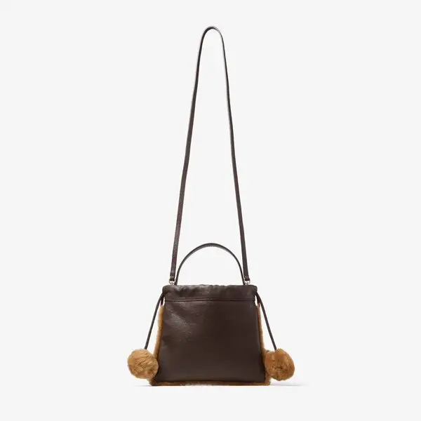 JIMMY CHOO Drawstring Pouch Top Handle Chocolate And Toffee Biker Leather And Shearling Drawstring Pouch With Pom-poms