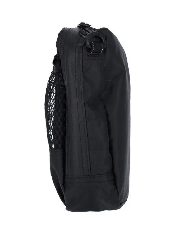 AND WANDER Shoulder Pouch "ecopack - Black