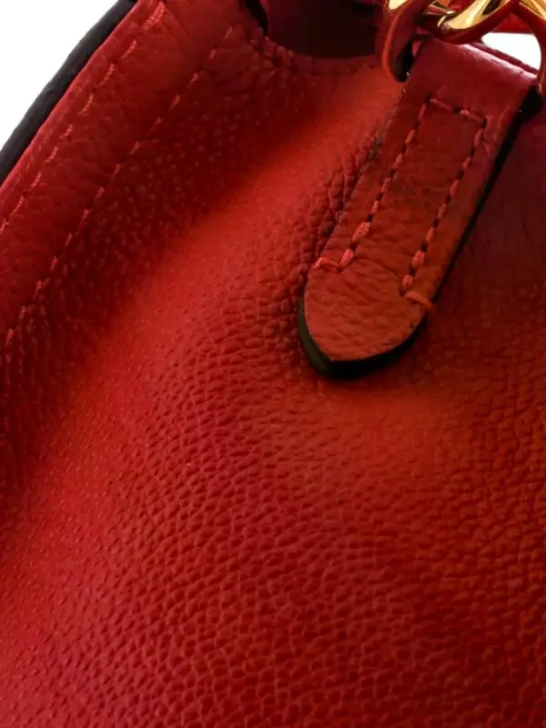 LOUIS VUITTON Sully Monogram Empreinte Leather Pm Tote Bag - Red