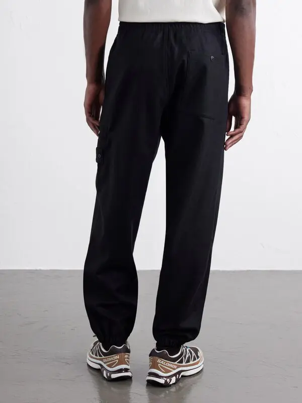 Stone Island Ghost Tapered Wool And Nylon-blend Flannel Drawstring Trousers