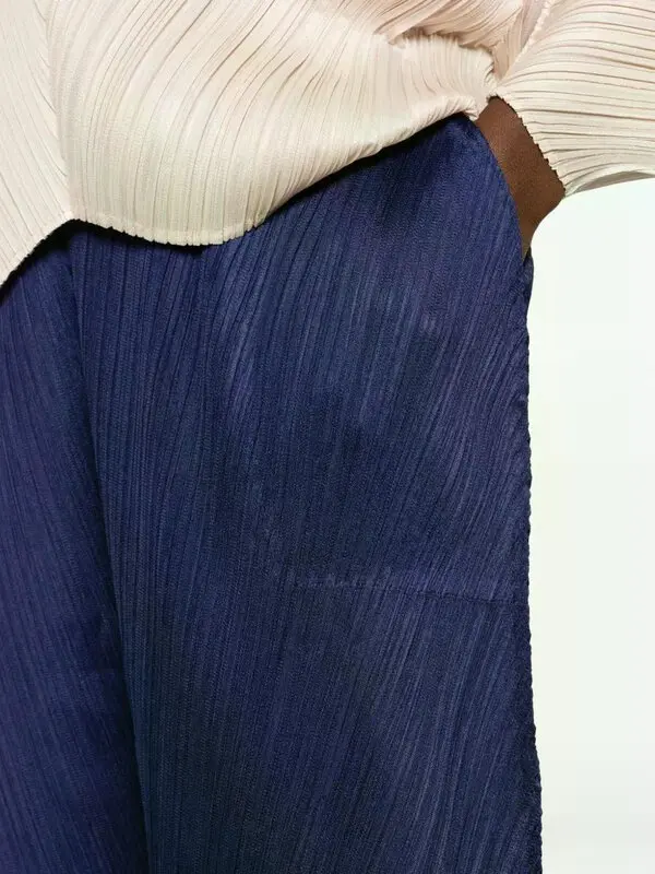 Issey Miyake Plissé-effect Cropped Trousers