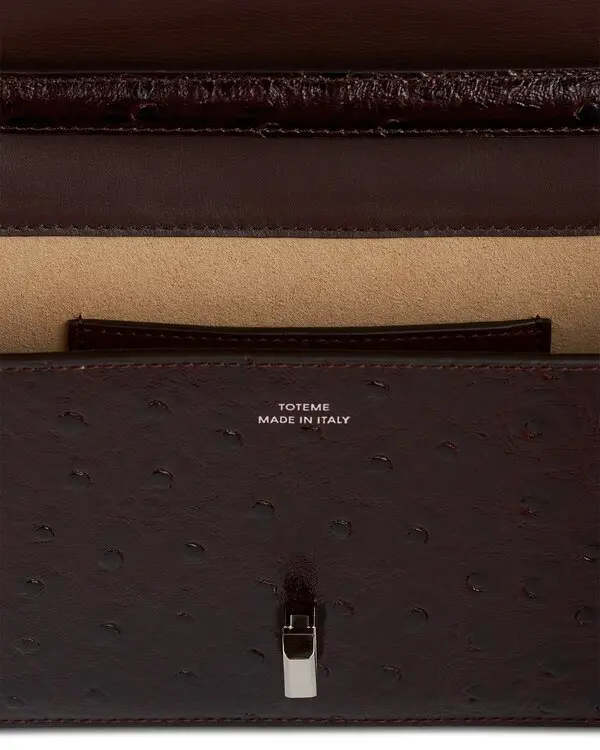 TOTEME T-lock Ostrich Embossed Leather Crossbody Bag