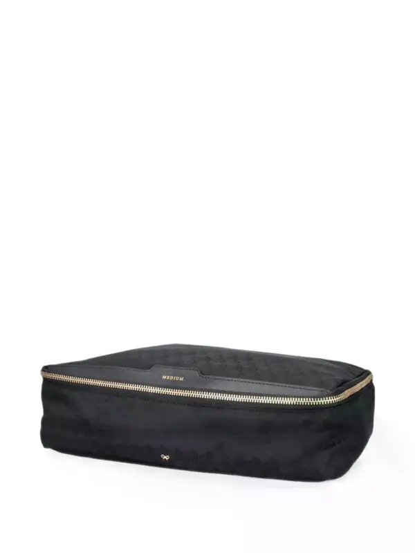 ANYA HINDMARCH Monogram-print Tassel-detail Clutch Bag