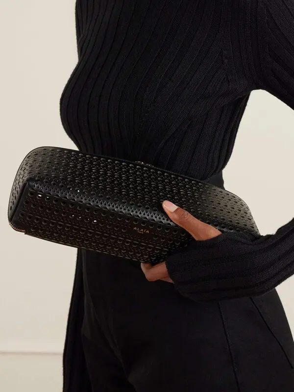 Alaïa Delta Laser-cut Leather Clutch
