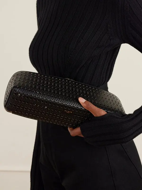 Alaïa Delta Laser-cut Leather Clutch