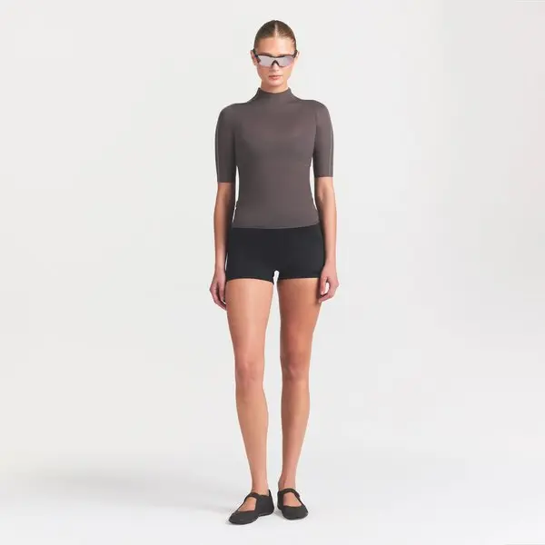 SKIMS Mock Neck Short Sleeve T Shirt | Grey | | Nike Weightless Layers