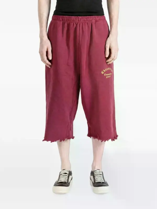 WILLY CHAVARRIA Logo-print Frayed-edge Track Shorts