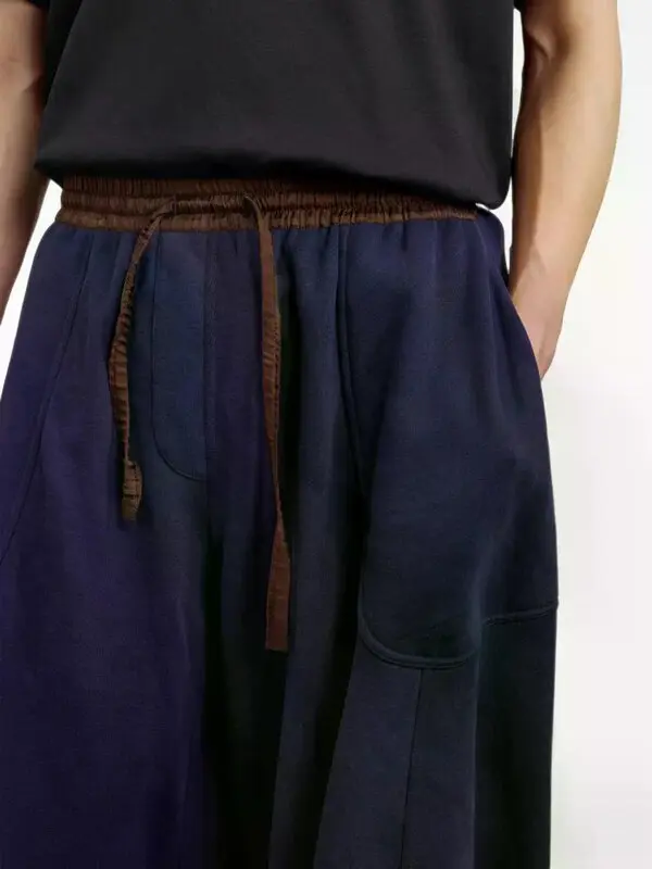 CROQUIS Oversized Curved-leg Trousers