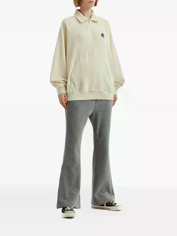 FINGERCROXX Ribbed-knit Logo-patch Flared Trousers