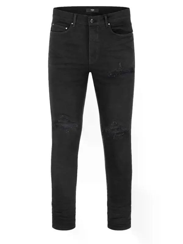 Amiri Distressed Ribbed-panel Jeans