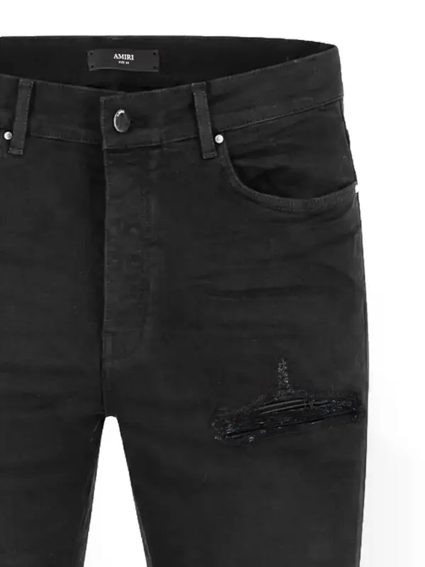 Amiri Distressed Ribbed-panel Jeans