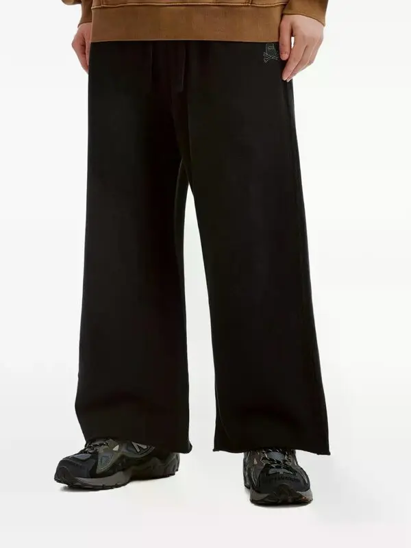 FINGERCROXX Logo-embroidered Raw-edge Trousers