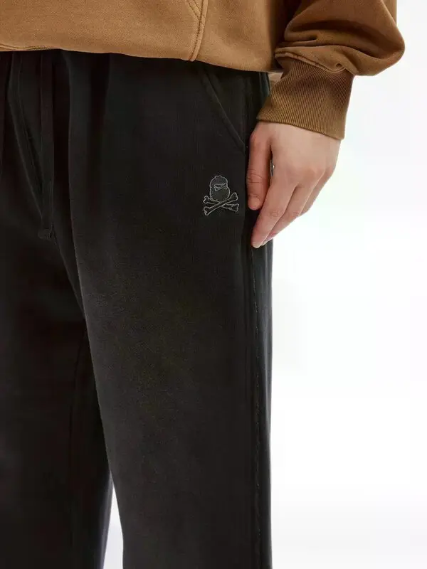 FINGERCROXX Logo-embroidered Raw-edge Trousers