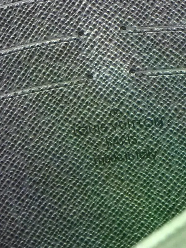 LOUIS VUITTON Pochette Voyage Monogram Taigarama Mm Clutch Bag