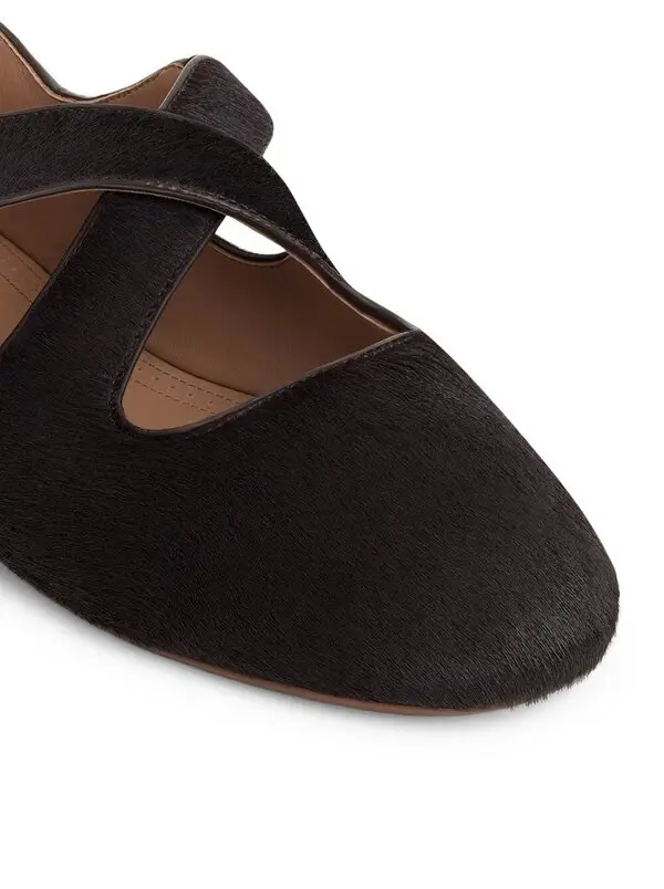 Alaïa Crossed Ponyskin Ballerinas