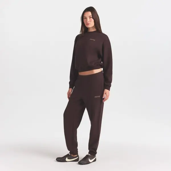SKIMS Jogger Pants With Embossed Logo | Deep Neutral | | Cotton Fleece