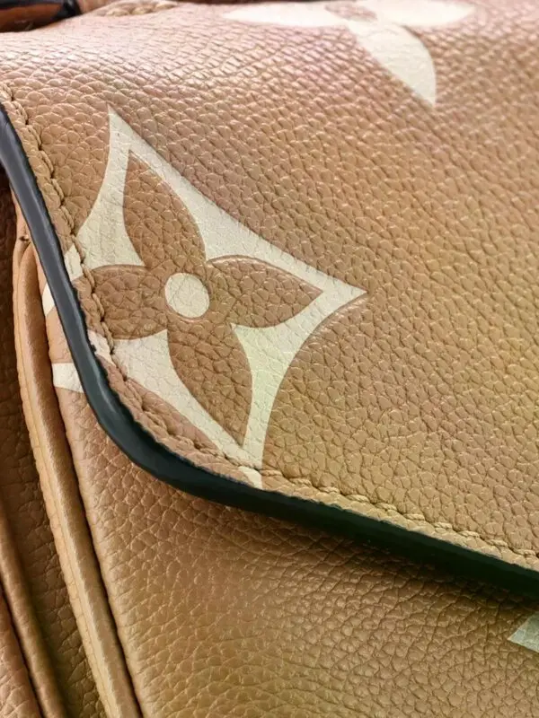 LOUIS VUITTON Pochette Metis Bicolor Monogram Empreinte Giant Crossbody Bag - Neutrals