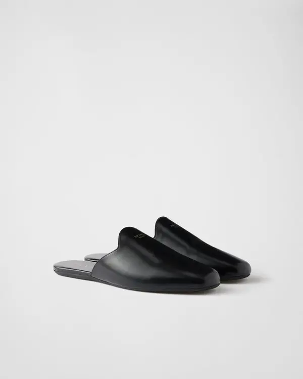 Prada Embossed-logo Leather Mules