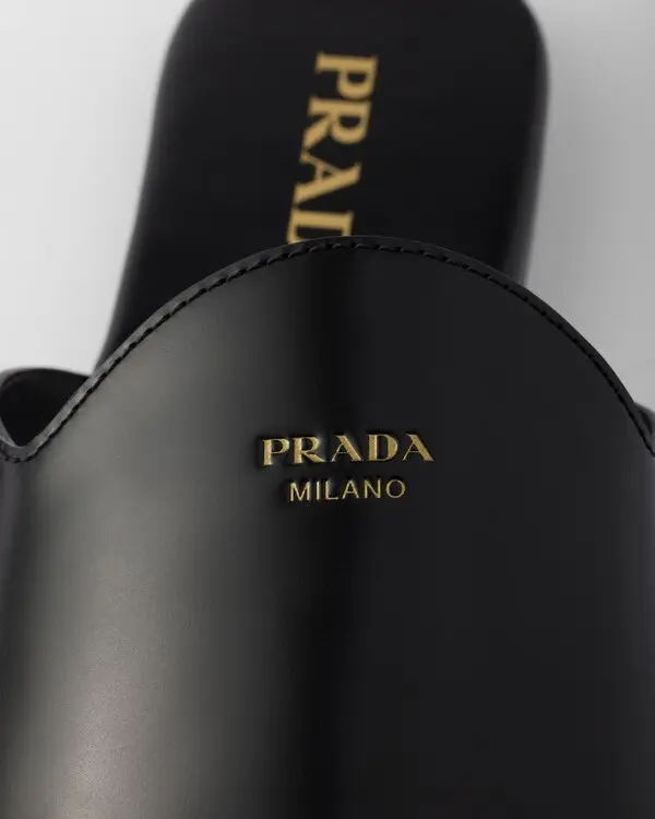 Prada Embossed-logo Leather Mules