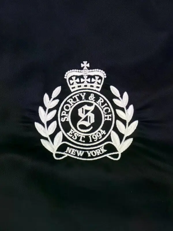 Sporty & Rich Health & Wellness Crest Varsity Jacket