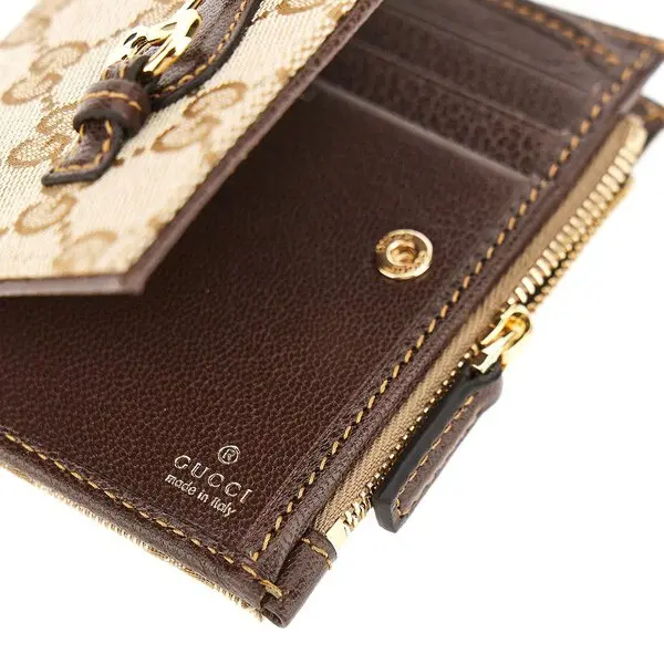 Gucci Gg Canvas Bi-fold Wallet With Horsebit - Brown