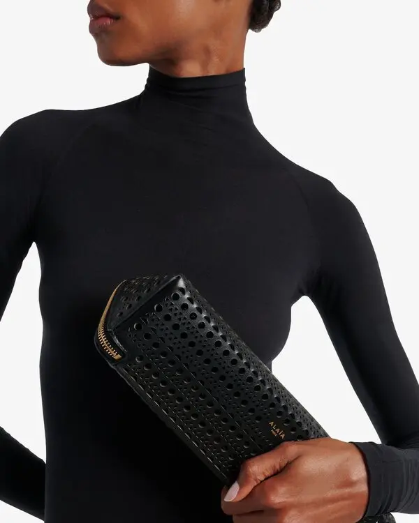 Alaïa Delta Perforated Vienne Clutch