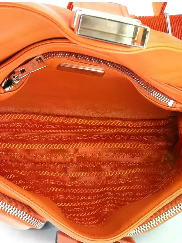 Prada Buckle Pocket Spazzolato Leather And Tessuto Crossbody Bag - Orange