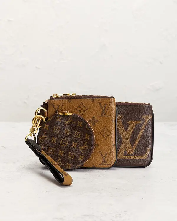 FWRD RENEW Louis Vuitton Reverse Monogram Giant Trio Pouch