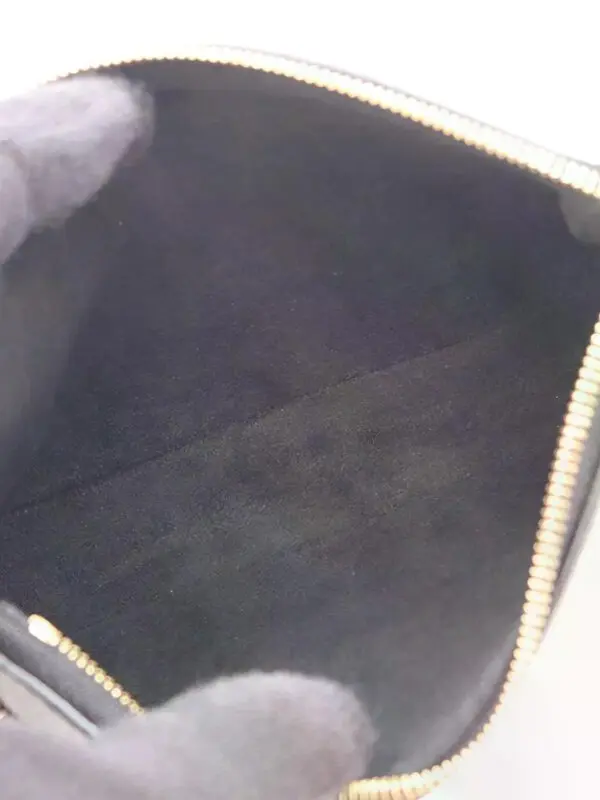 LOUIS VUITTON 2021-2026 Bicolor Monogram Empreinte Mini Pochette Accessoires Handbag