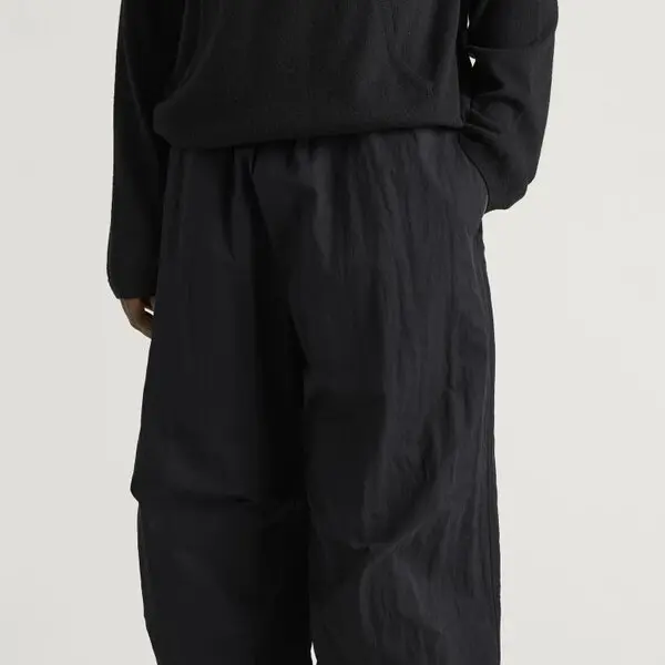 Studio Nicholson Logo Casual Pants