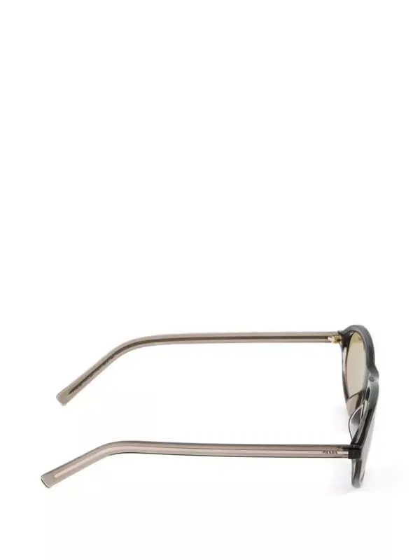 Prada Sunglasses With The Iconic Metal Plaque