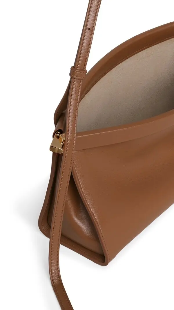 Alaïa Le Click East West Medium Bag In Calfskin