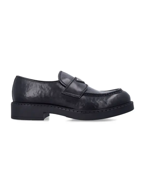 Prada Aged Leather Loafers With Elastic Gusset, Enameled Logo & Lightweight Rubber Sole - Nero