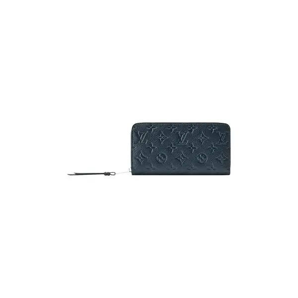 LOUIS VUITTON Zippy Wallet 'shimmery Ink Monogram Embossed Empreinte Cowhide Leather
