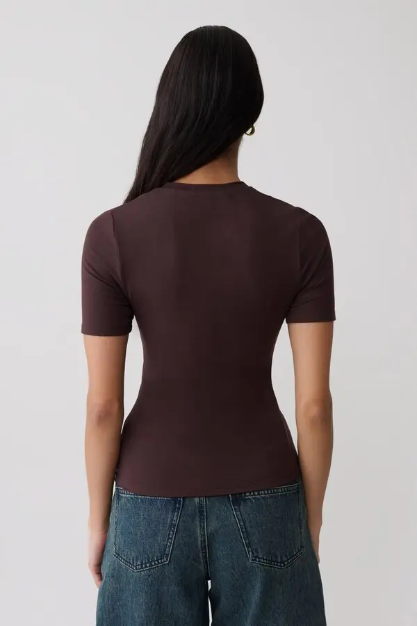 Meshki Janelle High V Neck Short Sleeve Top