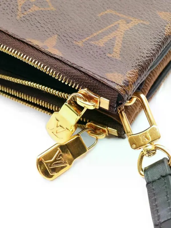 LOUIS VUITTON 2020 Double Zip Monogram Giant Reverse Canvas Clutch Bag