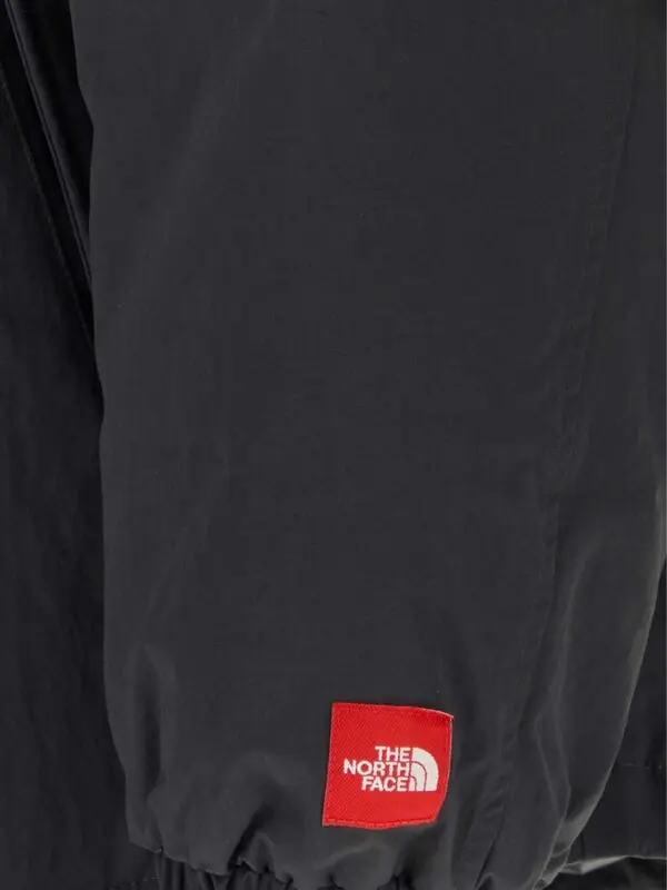 The North Face Short Padded Nylon Puffer Jacket With High Collar And Elasticated Cuffs