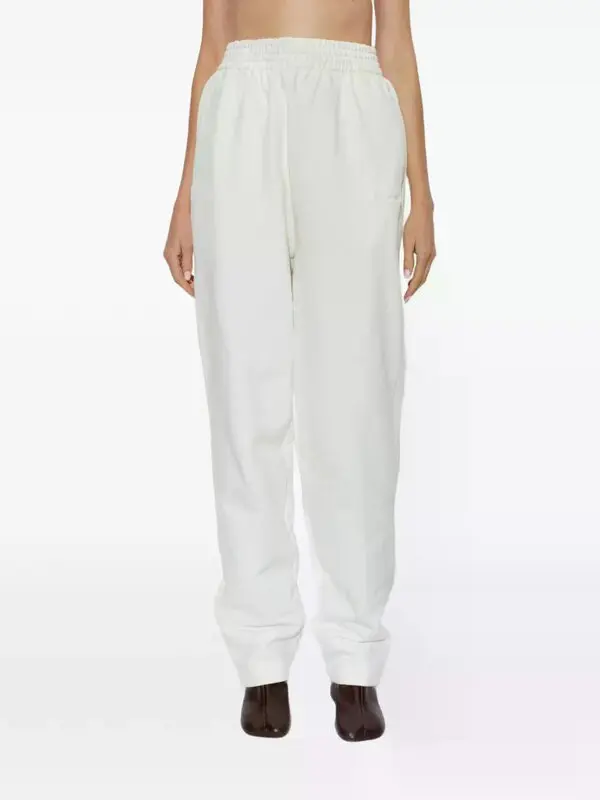 THE MANNEI Logo-embroidered Elasticated-waist Track Pants