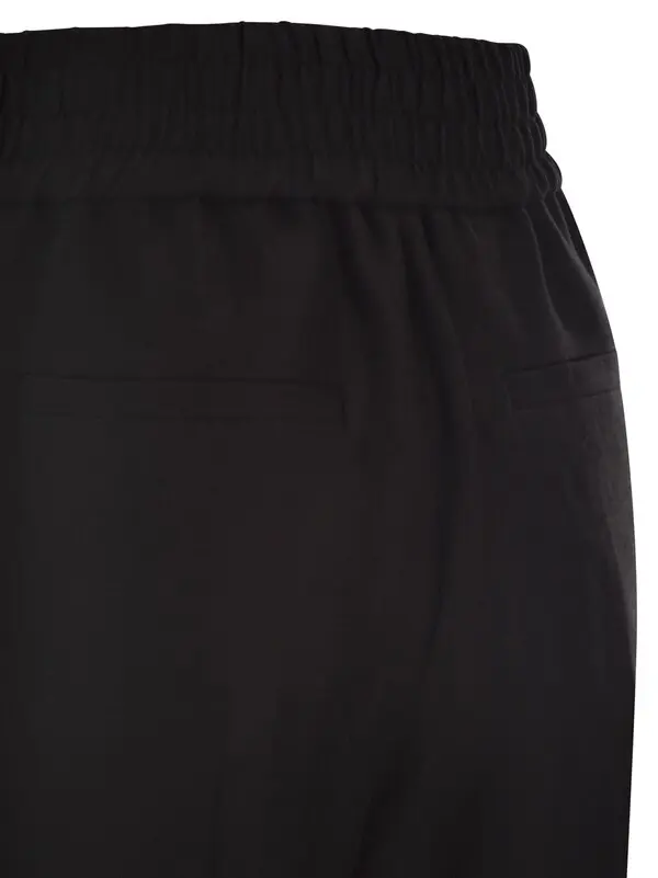 Brunello Cucinelli Baggy Pull-up Trousers In Viscose And Linen Fluid Twill - Black